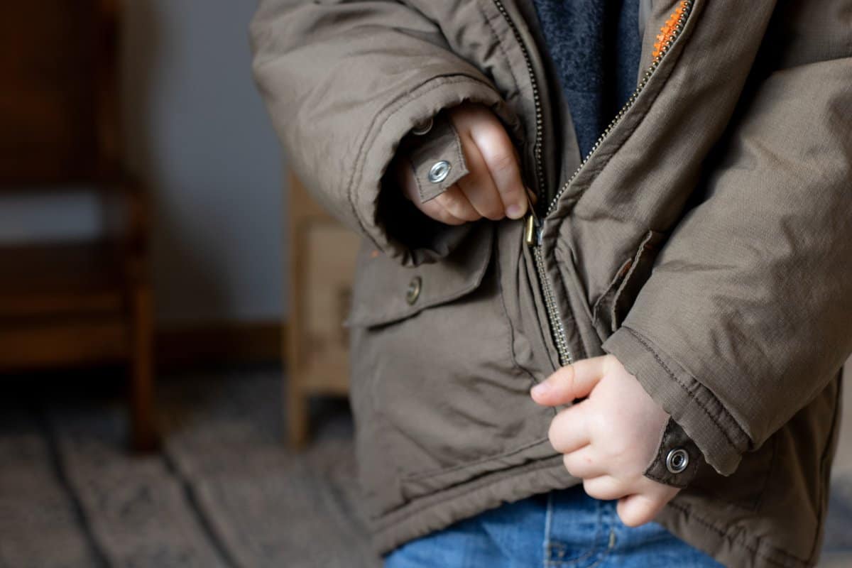 How to Teach a Toddler to Put on a Jacket: The Montessori Coat Flip ...